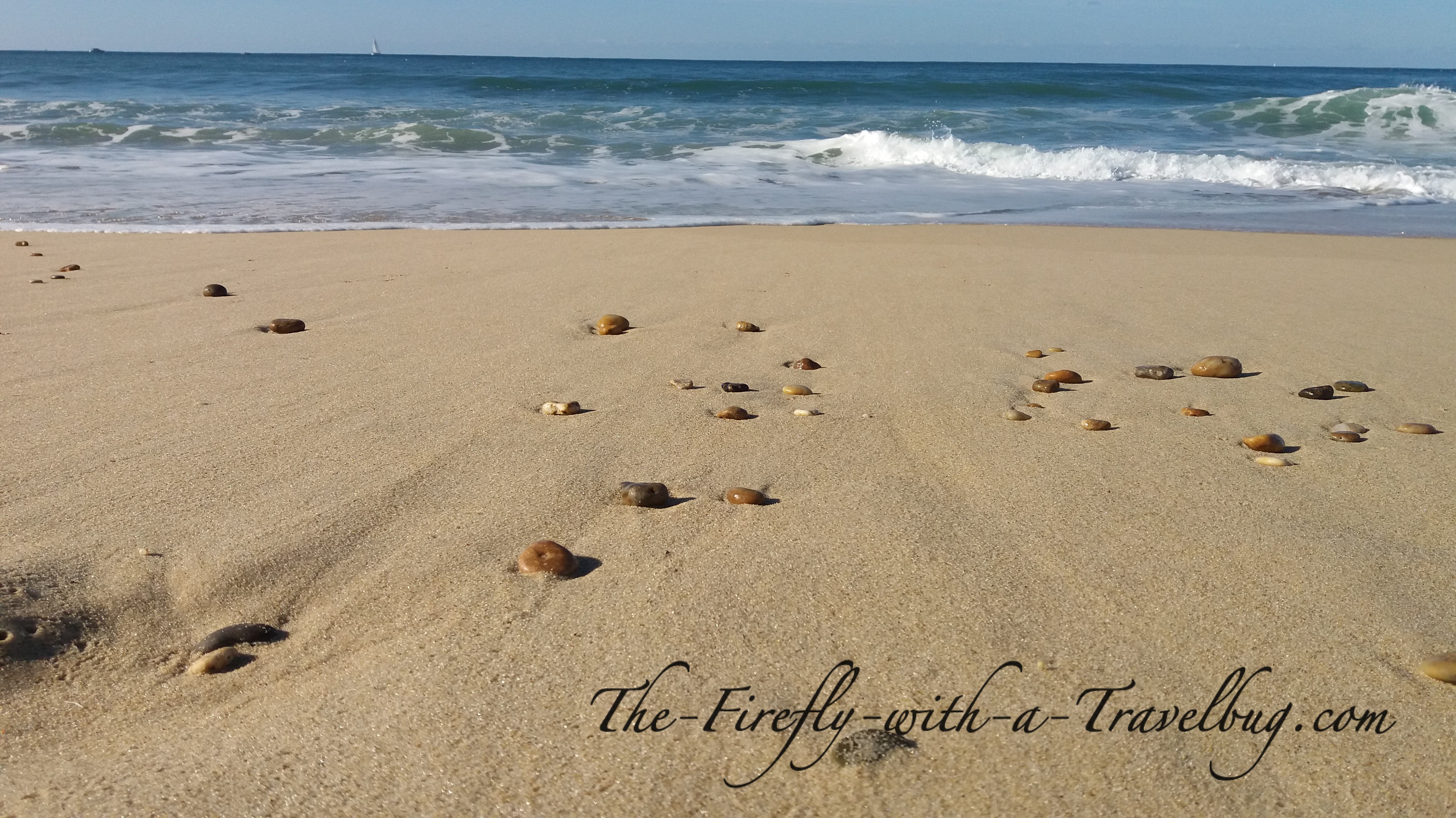 Pebbles on the beach – The Firefly with a Travelbug